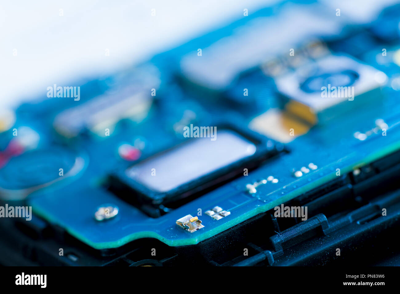 Fix and repair cell phone PCB Stock Photo - Alamy