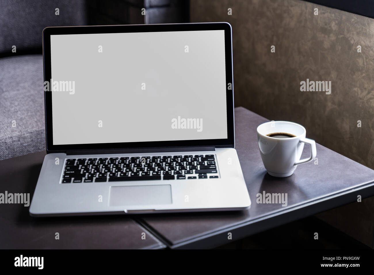 mock up Using laptop with blank screen computer modern Stock Photo - Alamy