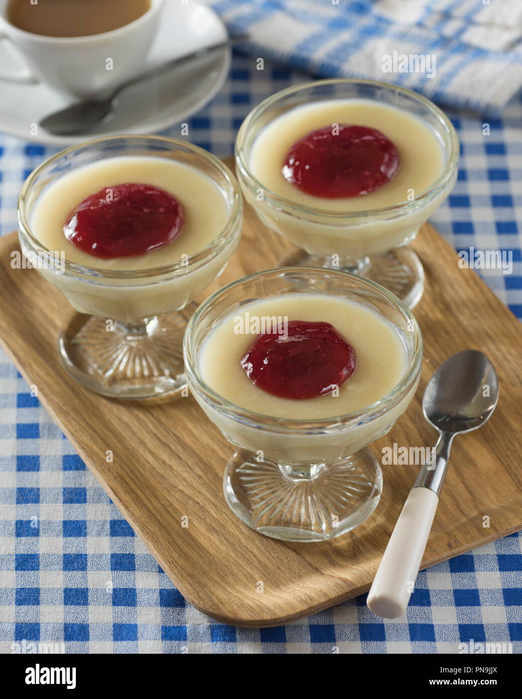 Semolina pudding with jam. Traditional dessert. Food UK Stock Photo - Alamy