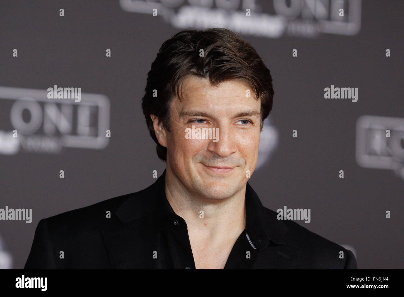 Nathan Fillion at the world premiere of "Rogue One: A Star Wars Story ...