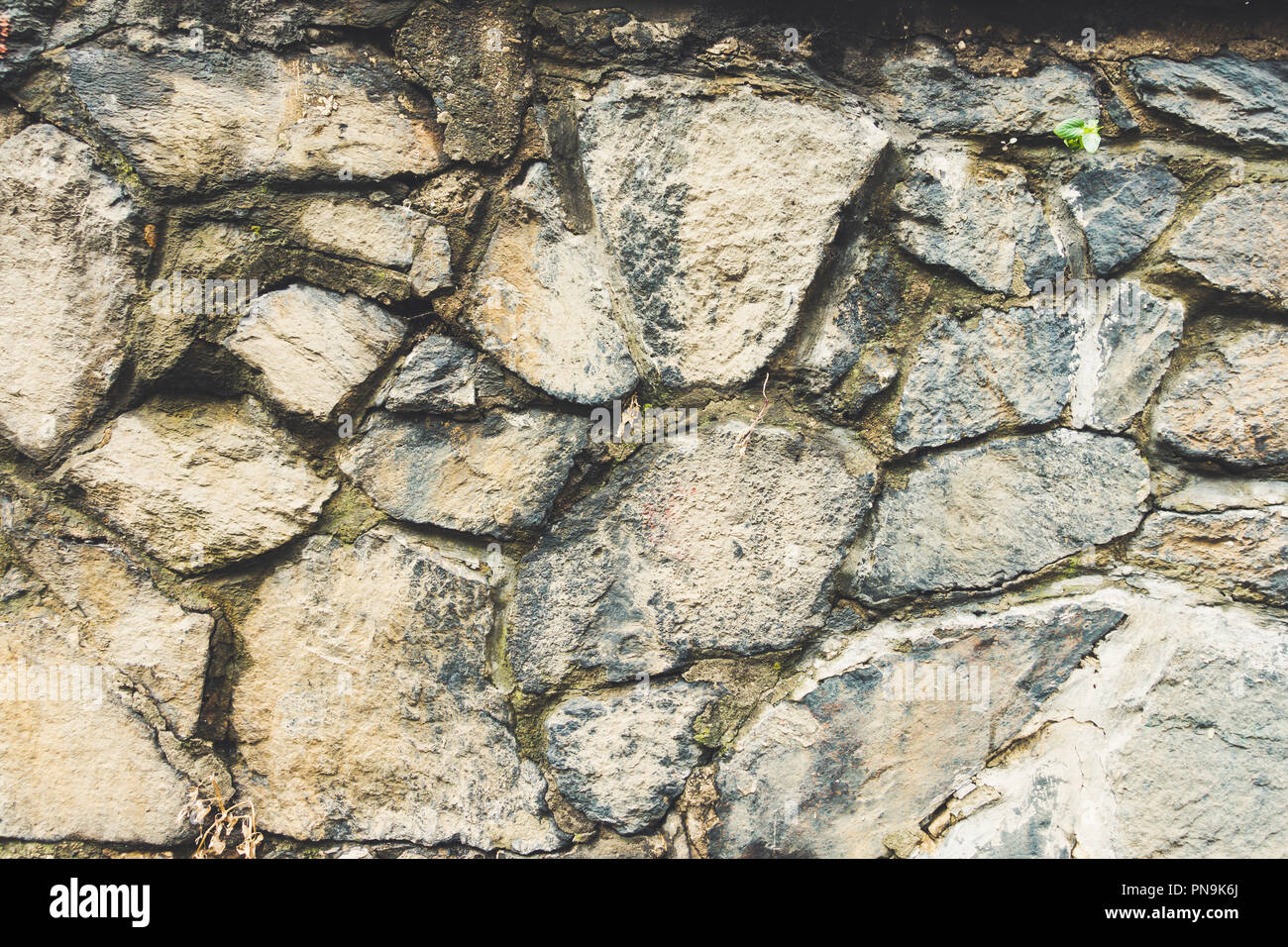 Old stone wall textures and backgrounds Stock Photo - Alamy