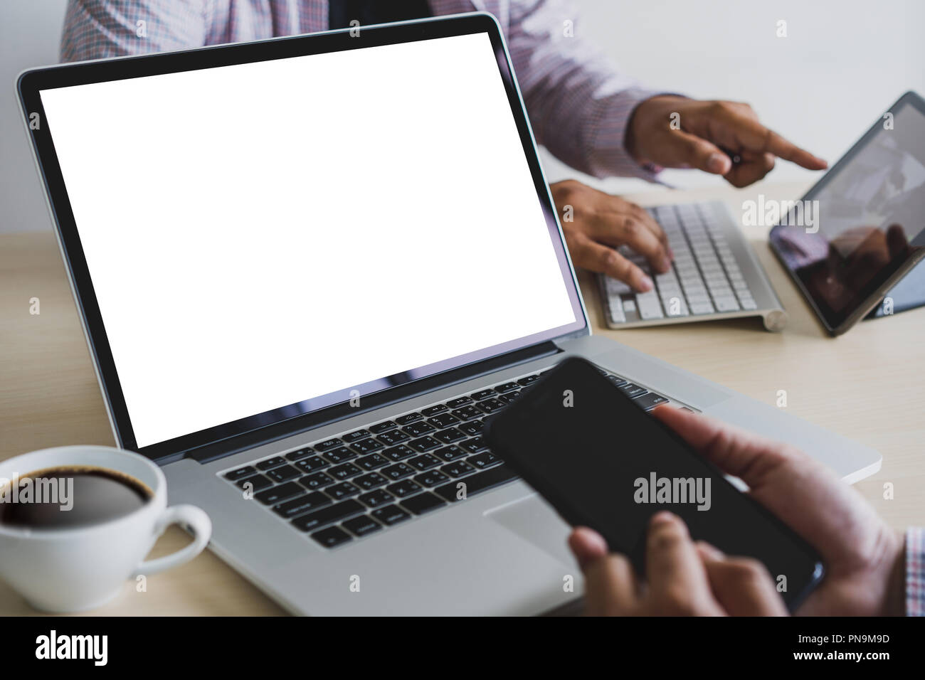 Laptop with blank screen on table. Workspace background new project on ...