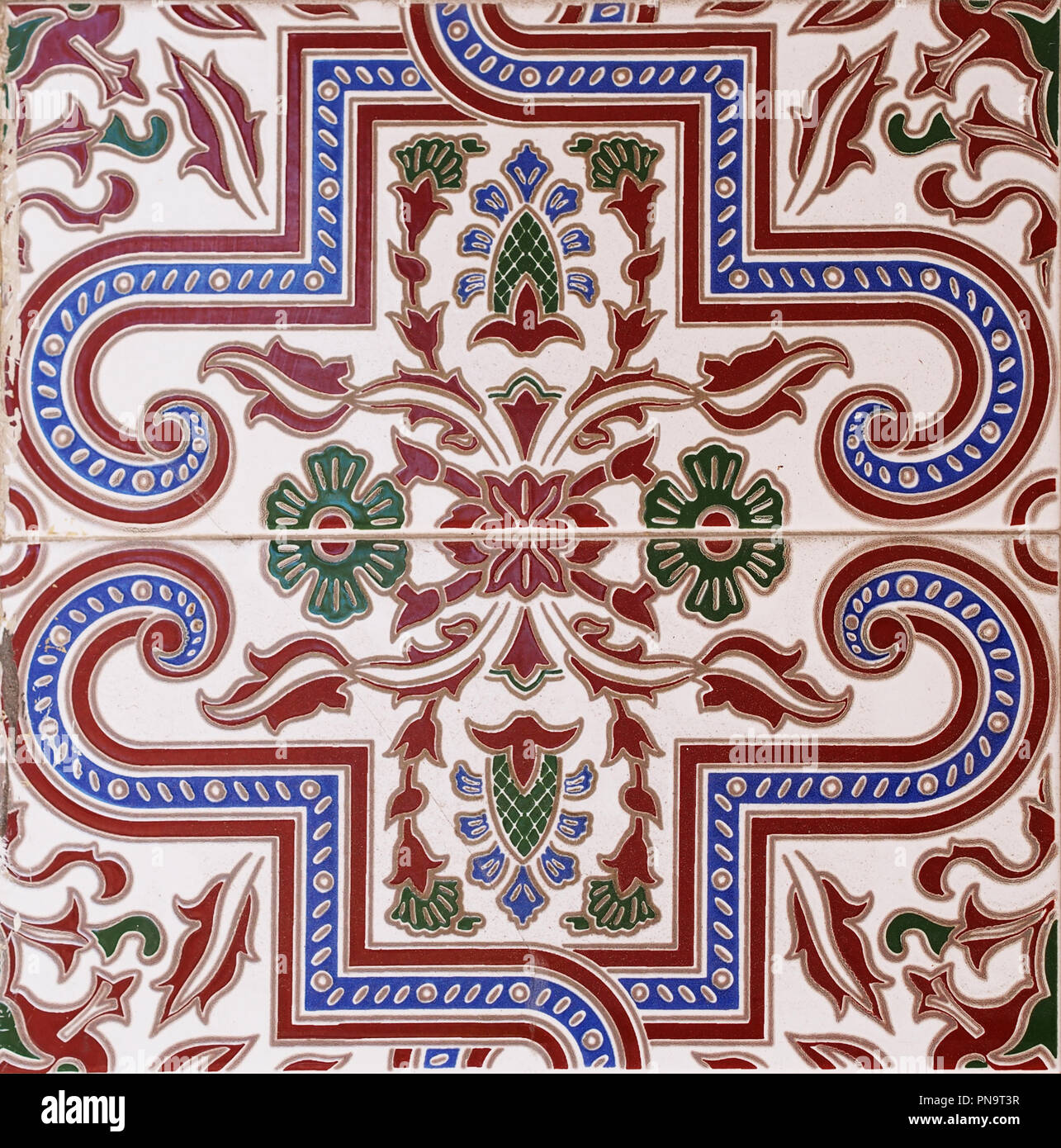 Detail of the traditional tiles from facade of old house. Decorative ...