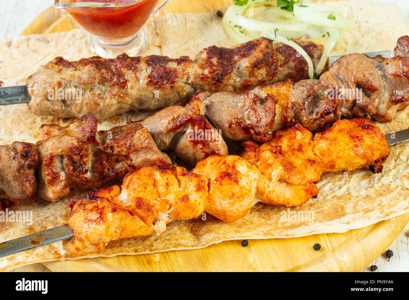 Grilled meat kebab mix plate assortment Stock Photo - Alamy