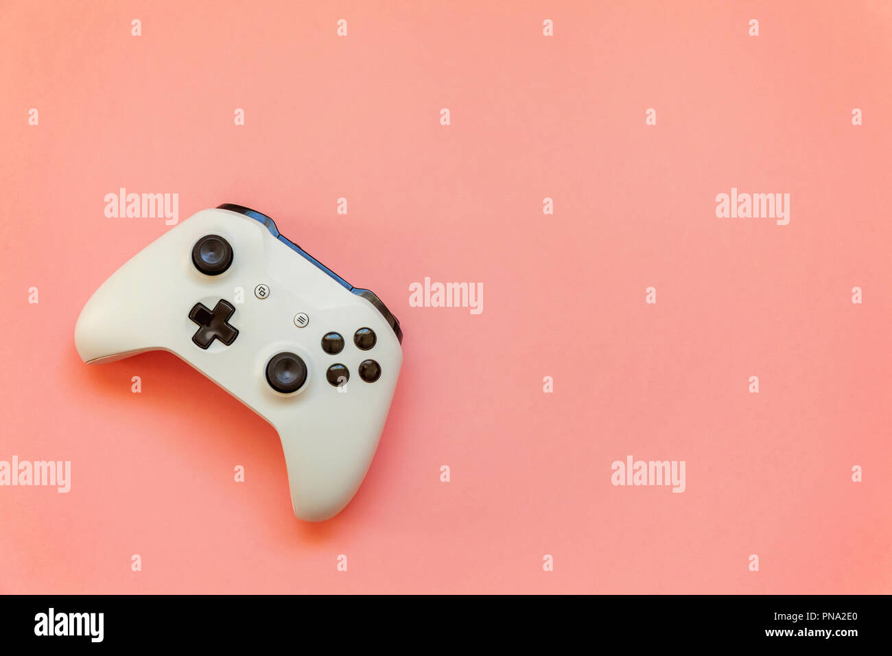 White Joystick Gamepad Game Console On Pink Colourful Trendy Modern