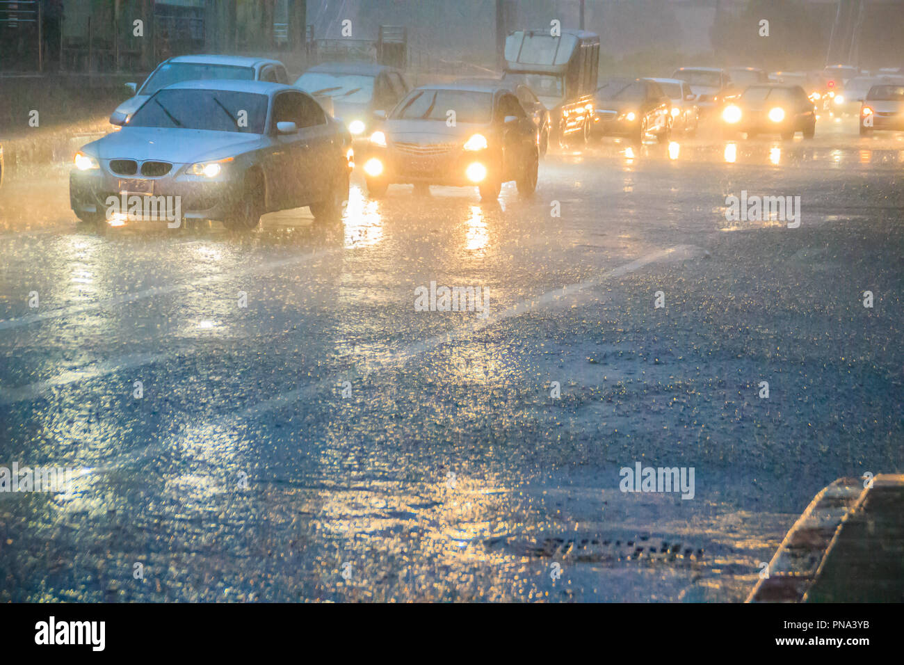 Bangkok, Thailand - July 6. 2017: Driving car through the heavy rain in ...