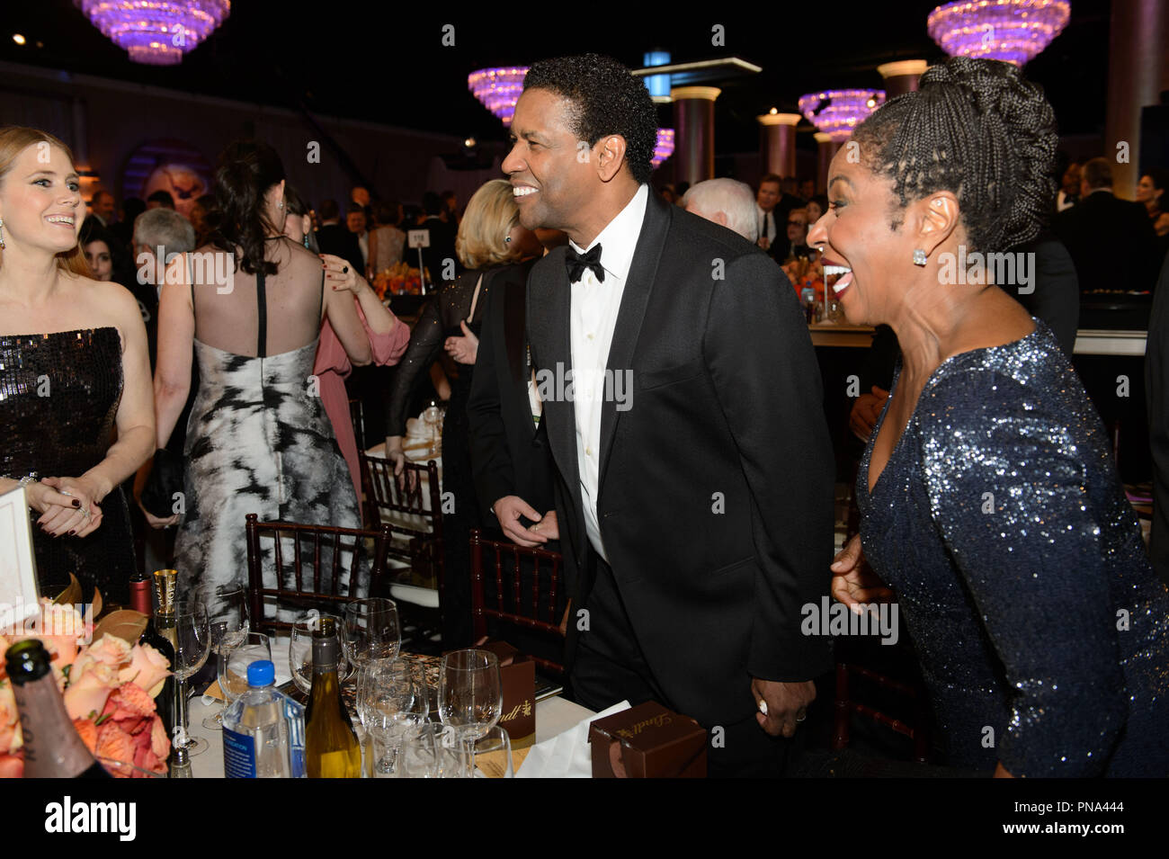 Amy Adams, Denzel Washington and Pauletta Washington attends the 74th ...