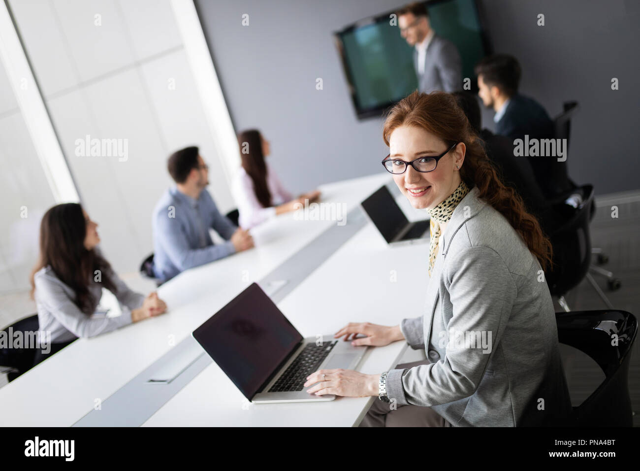 Business colleagues in conference room during meeting Stock Photo - Alamy