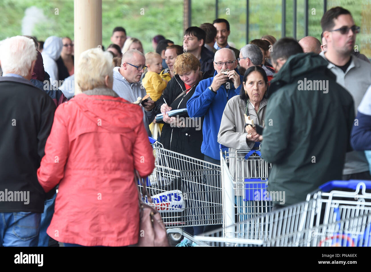 Customers queue outside Tesco's new Jack's store in Chatteris ...