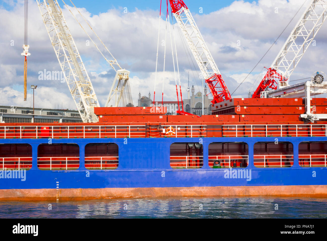 The container vessel during discharging at an industrial port and move ...