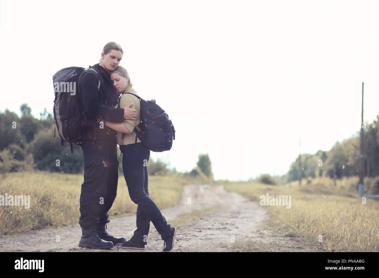 Traveling with a backpack on foot Stock Photo - Alamy
