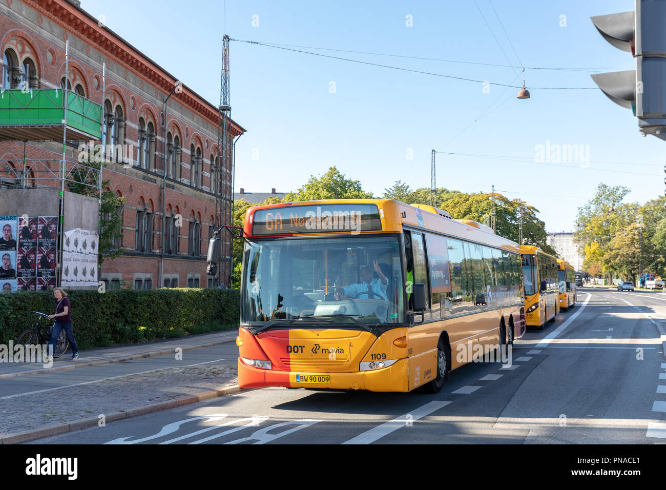 Yellow Copenhagen Bus, with 6A Noerreport St. sign on front; Soelvgade ...