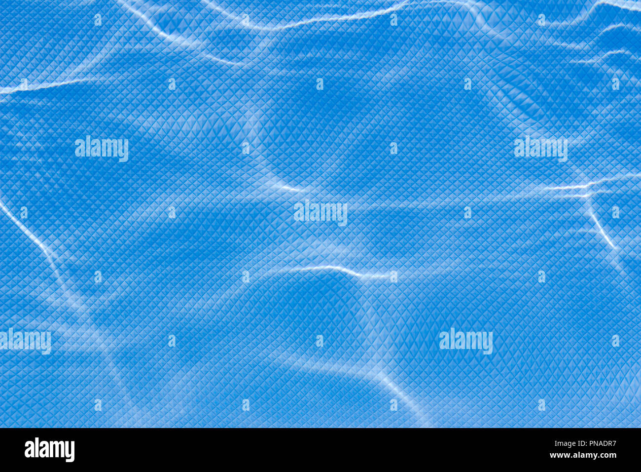 Refractive light distortions in wavy water, on a square shaped grid ...