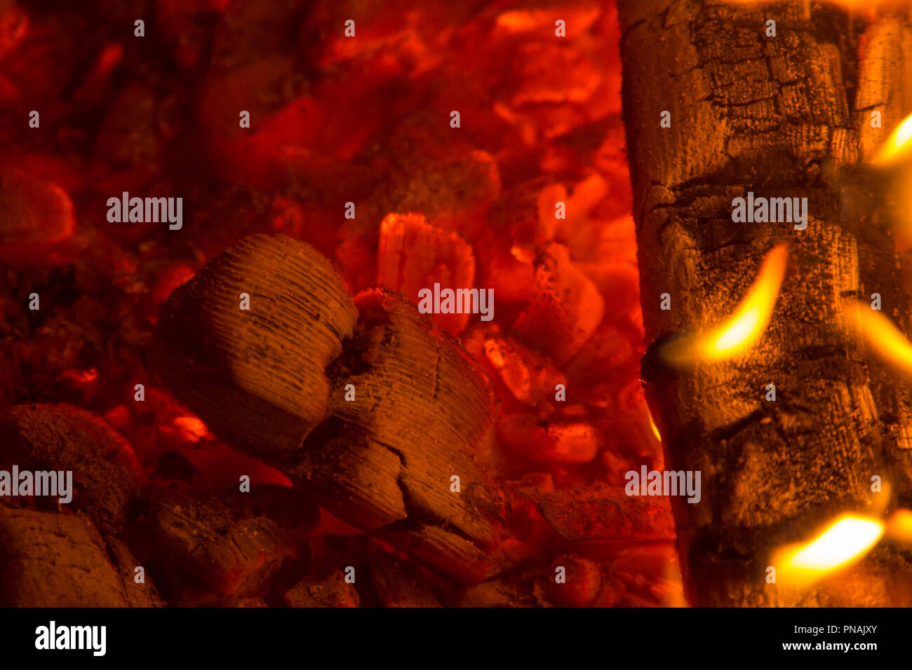 Coal glowing in the fireplace Stock Photo - Alamy