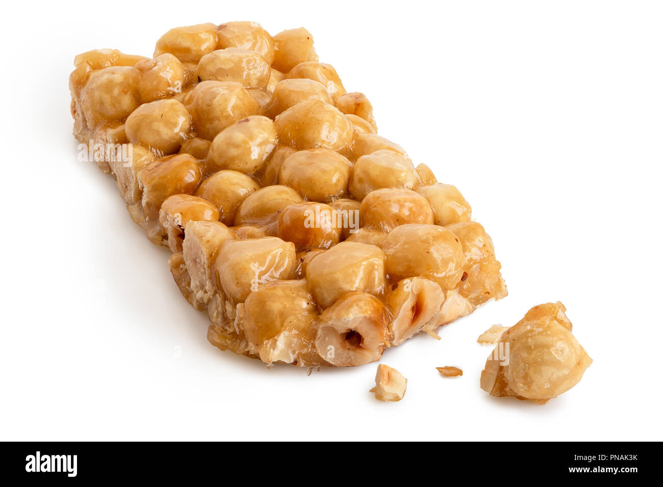 Broken hazelnut snack bar isolated on white Stock Photo - Alamy