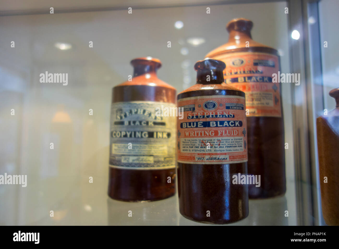 Rows of ink wells on display at Stephens House and Gardens, Finchley ...