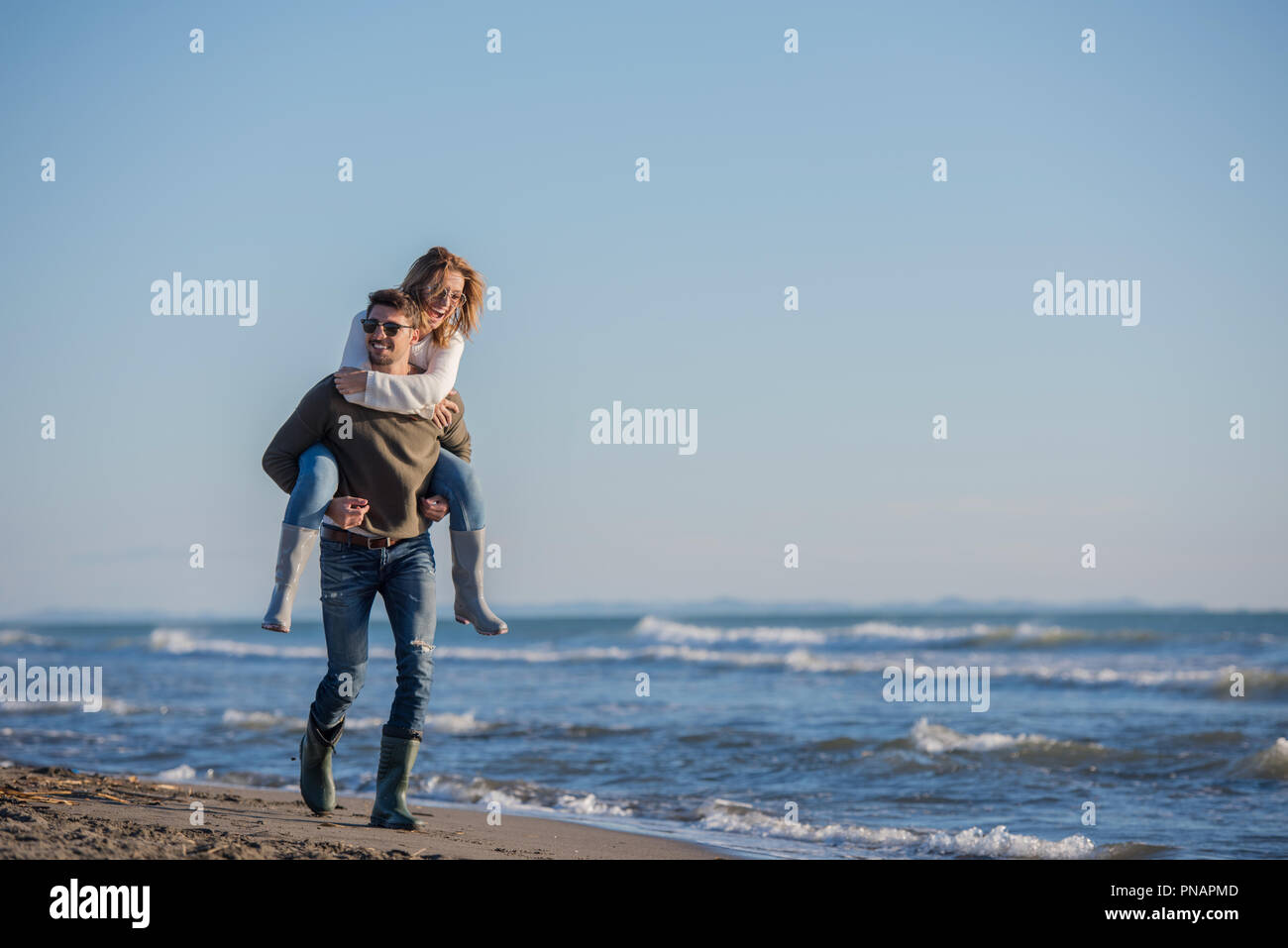 Piggy back adults hi-res stock photography and images - Alamy