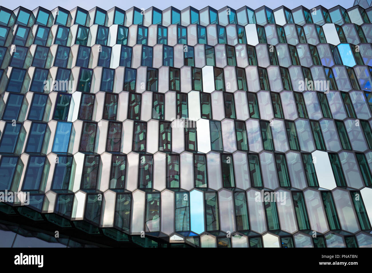 Modern architecture glazing - hexagonal coloured glass in shape of ice ...