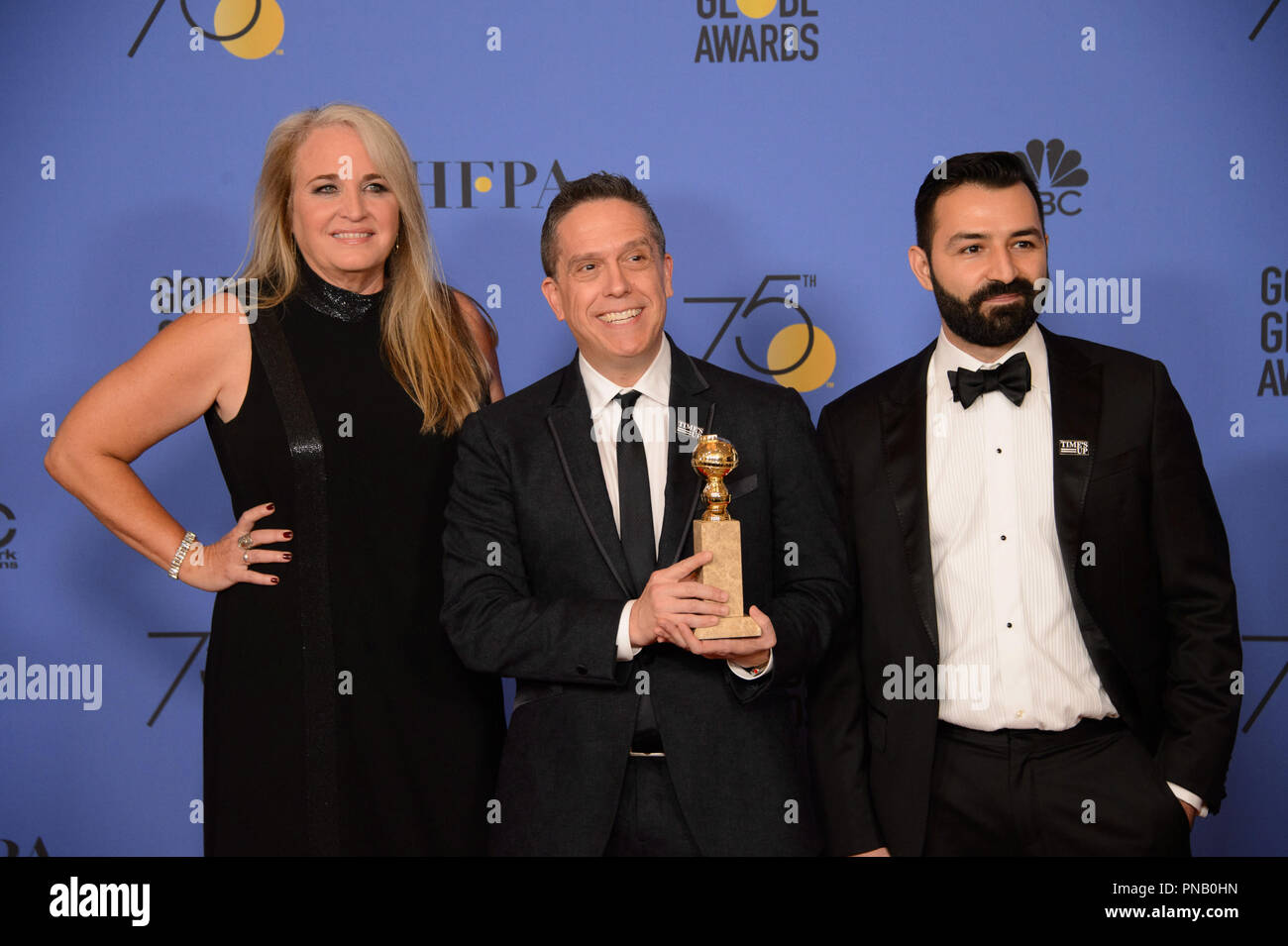 Darla K. Anderson, Lee Unkrich, and Adrian Molina pose with the Golden ...