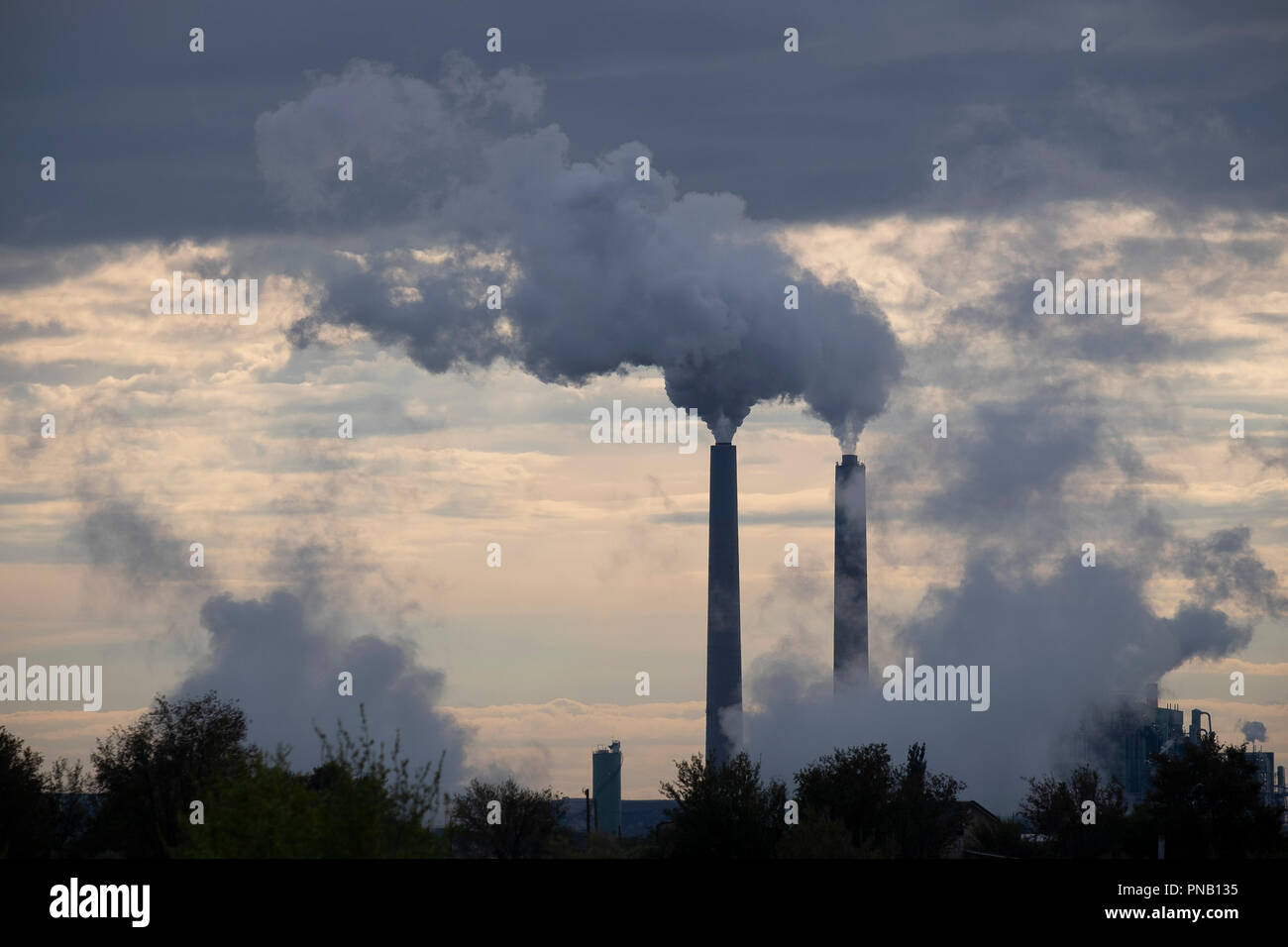 Belching steam clouds above a coal electric plant Stock Photo - Alamy