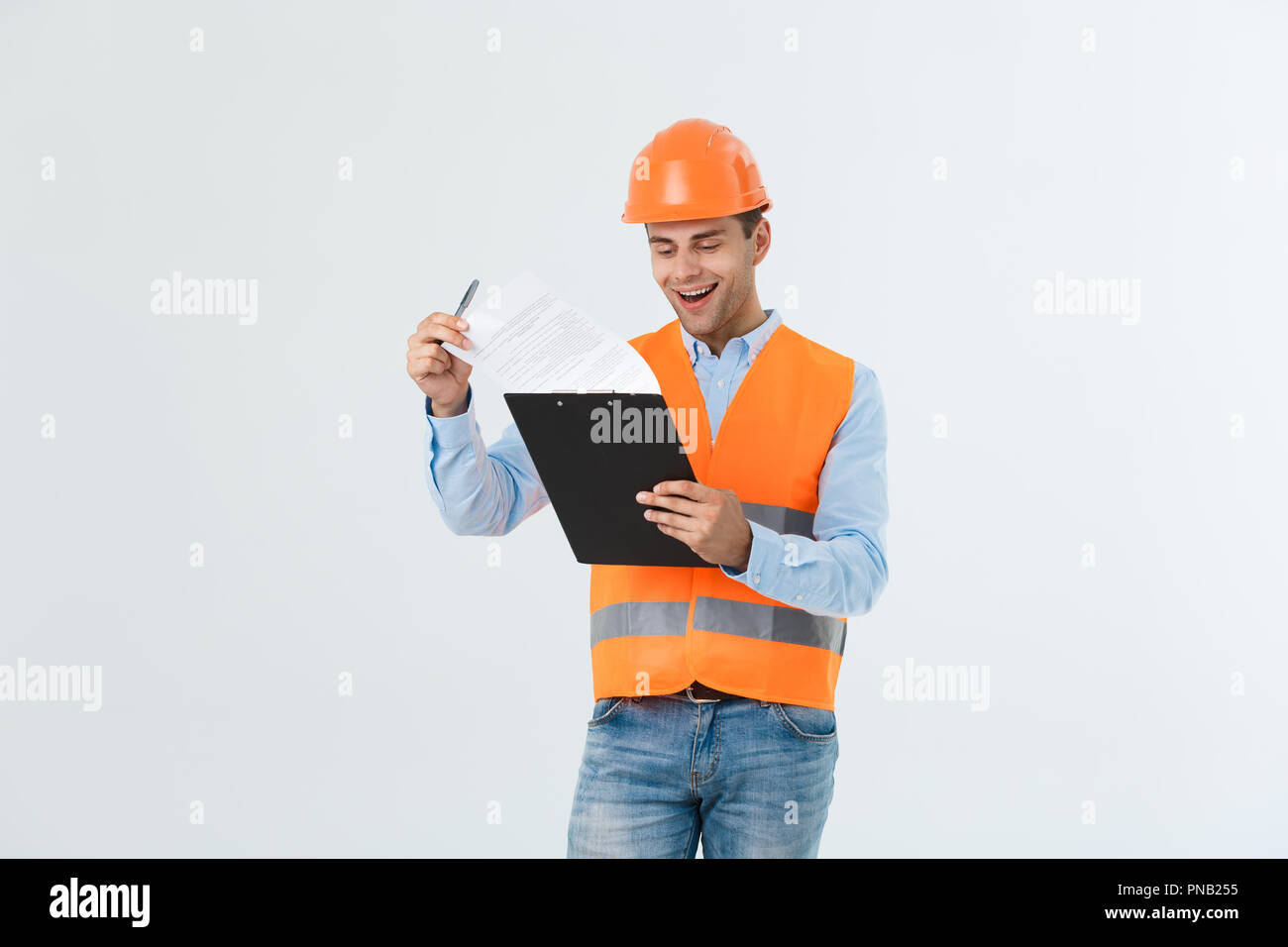 Civil engineer or architech and worker with safety helmet checking ...