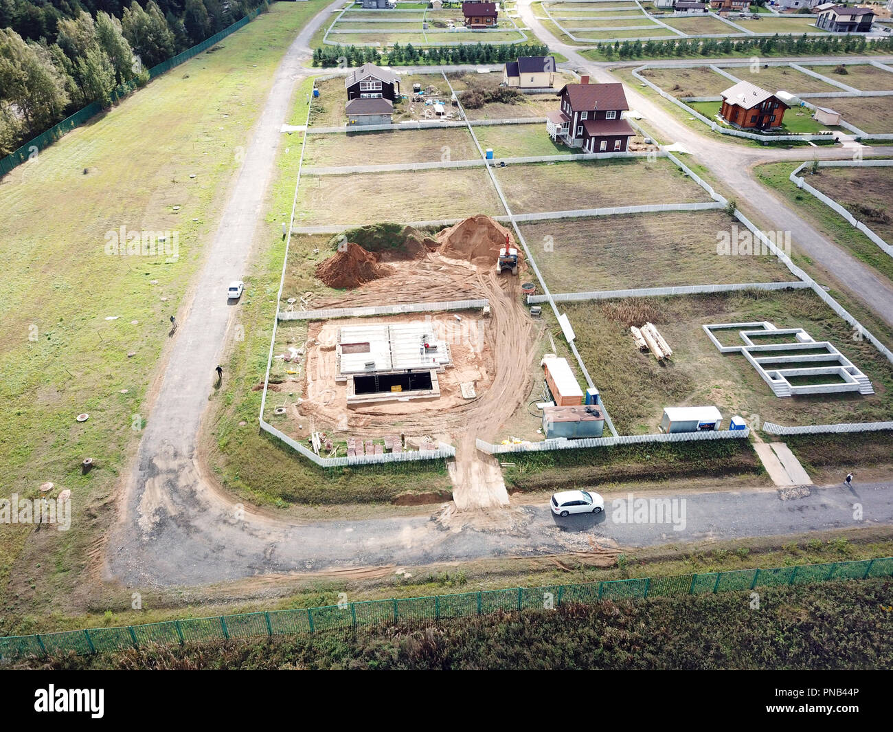 Aeriial view of excavation works and construction area with unfinished ...