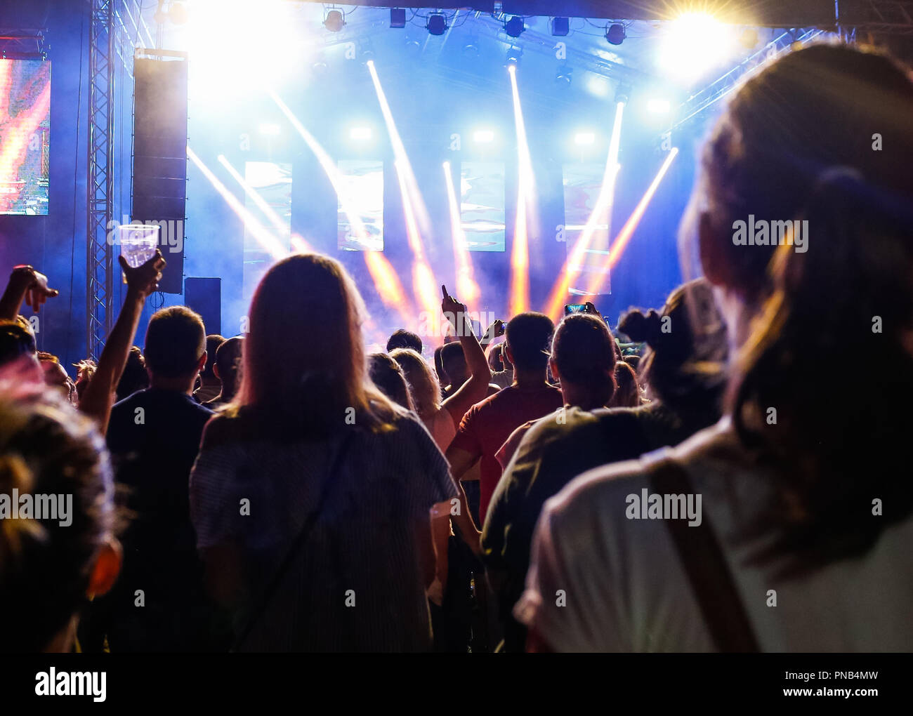 Hands raised crowd hi-res stock photography and images - Alamy