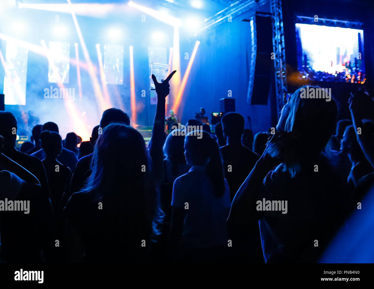 Hands raised crowd hi-res stock photography and images - Alamy