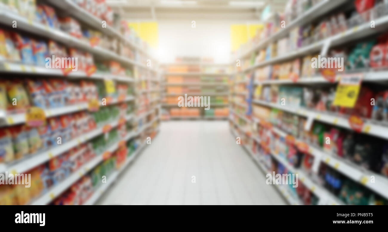 Blurry shopping shelves in supermarket and department store. Shopping ...