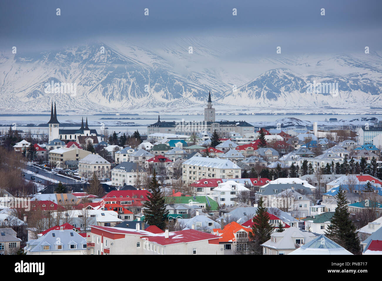 The capital city of Reykjavik with traditional bright coloured rooves ...