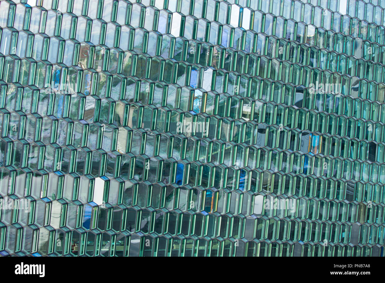 Modern architecture glazing - hexagonal coloured glass in shape of ice ...