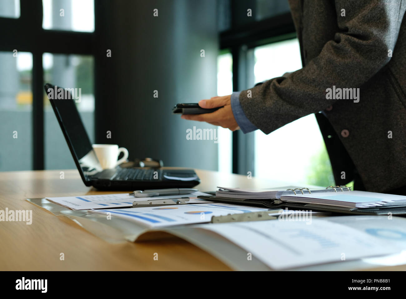 businessman using mobile phone at workplace. startup man working at ...
