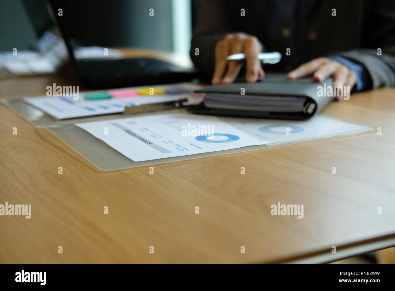 man organize plan with notebook. businessman working at workplace ...