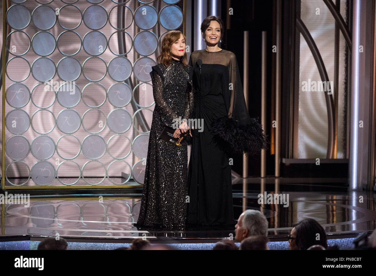 Isabelle Huppert and Angelina Jolie at the 75th Annual Golden Globe ...