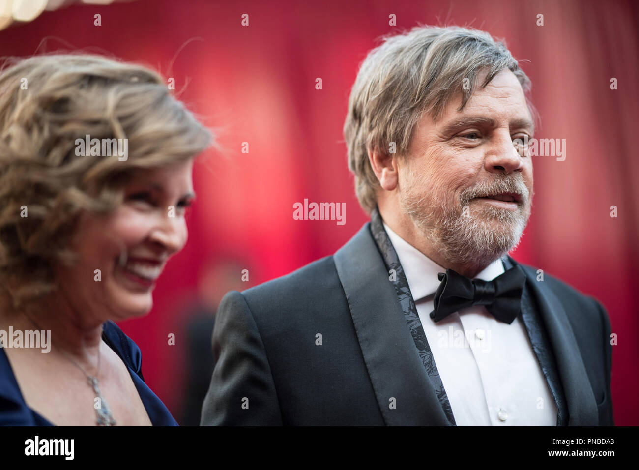 Mark Hamill and Marilou York arrive on the red carpet of The 90th ...