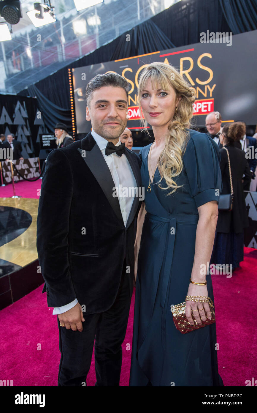 Oscar Isaac and guest arrive on the red carpet of The 90th Oscars® at ...