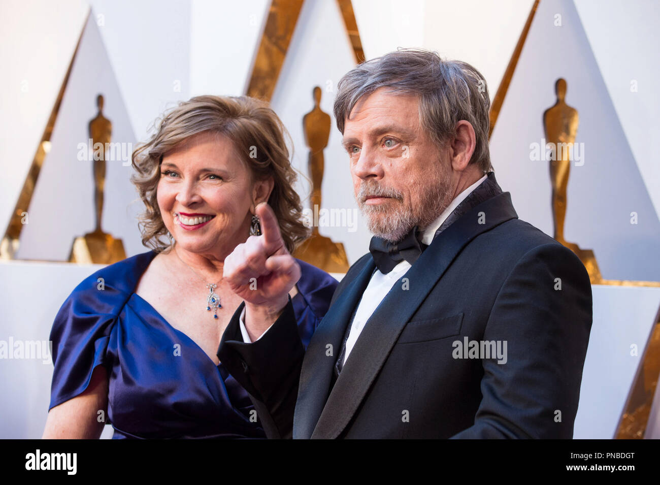 Mark Hamill and Marilou York arrive on the red carpet of The 90th ...