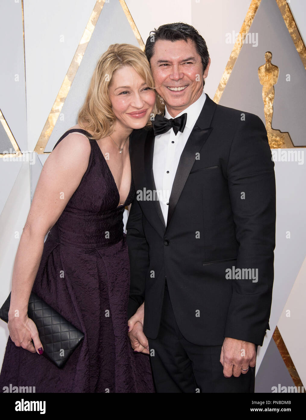 Lou Diamond Phillips and guest arrive on the red carpet of The 90th ...