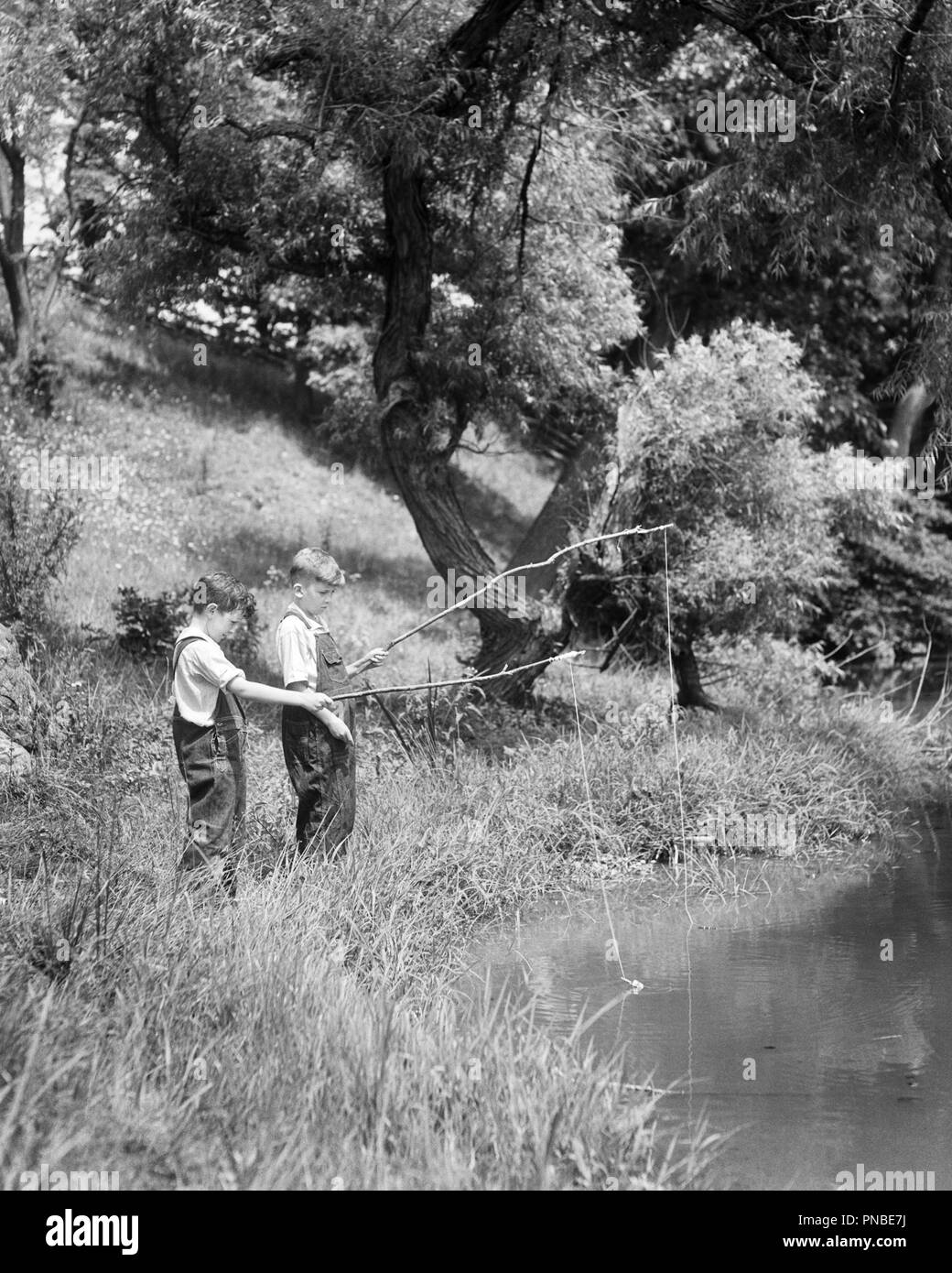 Overalls denim retro Black and White Stock Photos & Images - Alamy