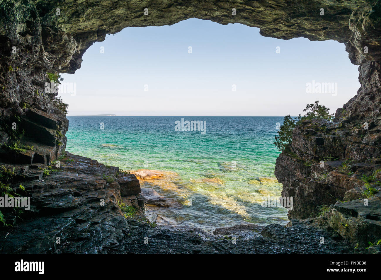 Landscape view from a cave at Bruce Peninsula shoreline at Cyprus Lake ...
