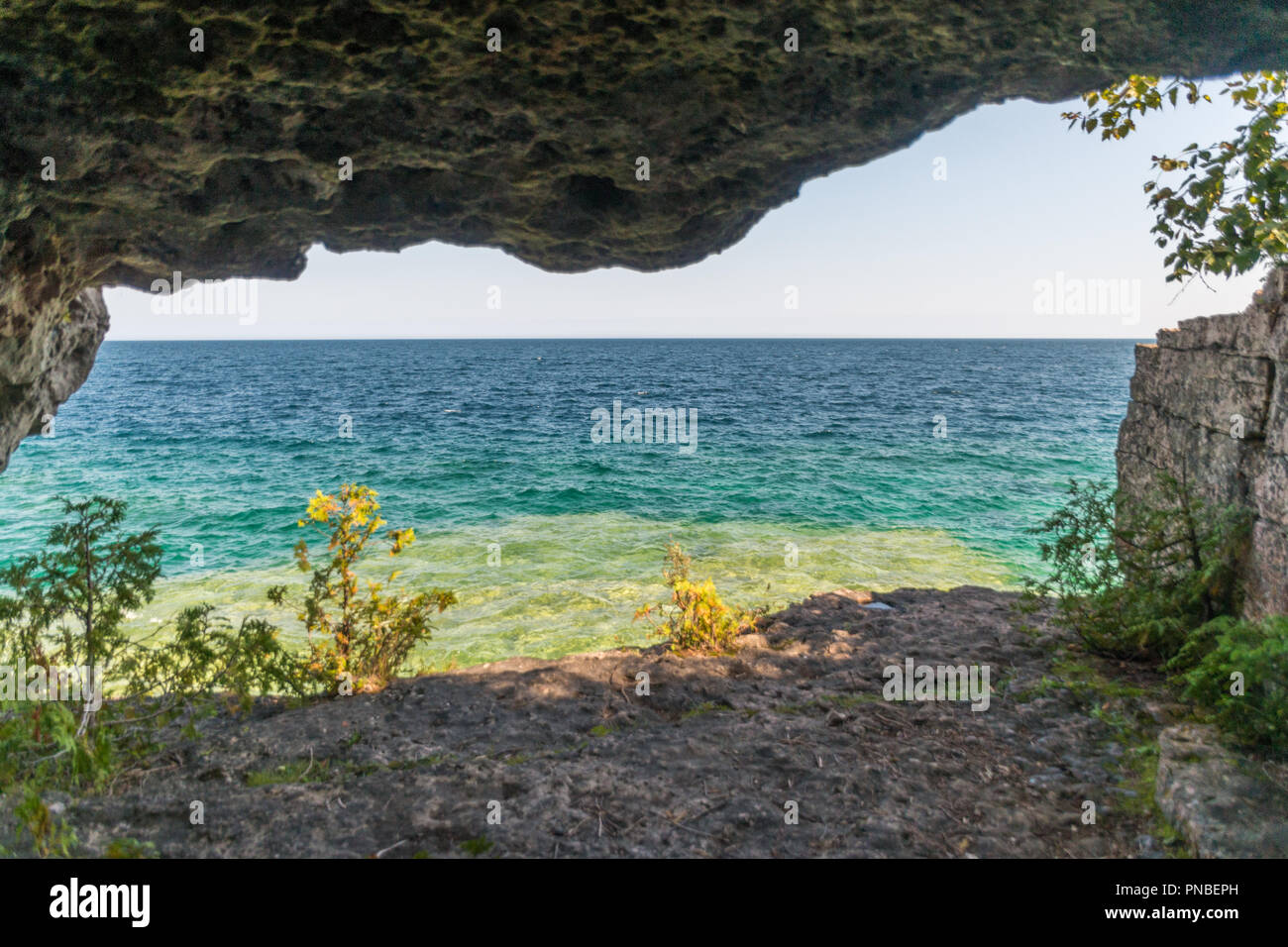 Landscape view from a cave at Bruce Peninsula shoreline at Cyprus Lake ...