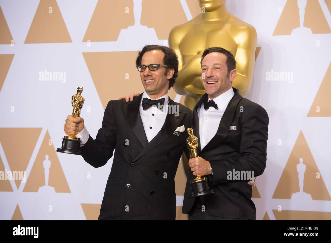 Dan Cogan and Bryan Fogel pose backstage after winning the Oscar® for ...
