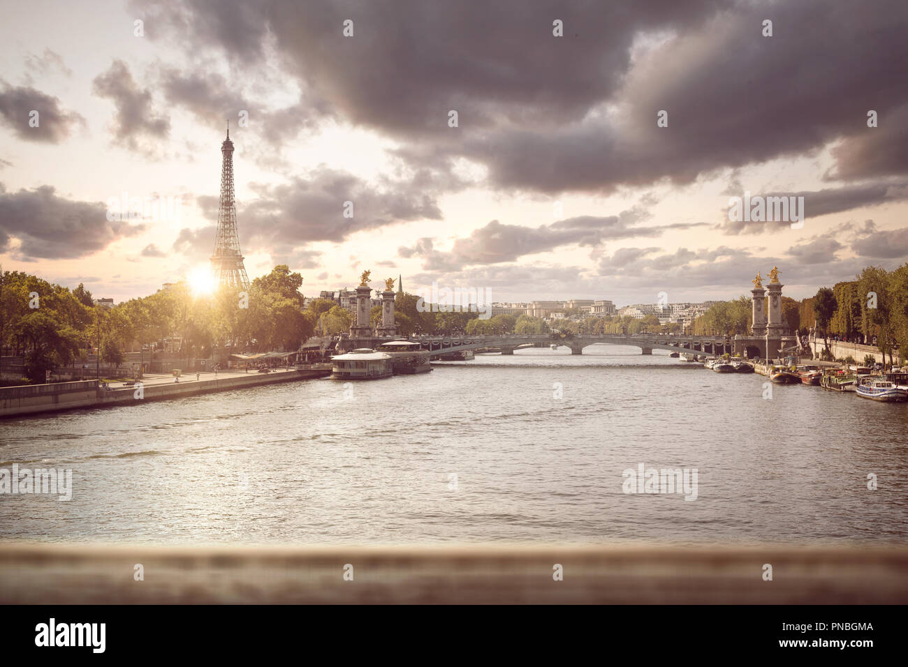Paris – Seine with Eiffel tower at sunset Stock Photo - Alamy