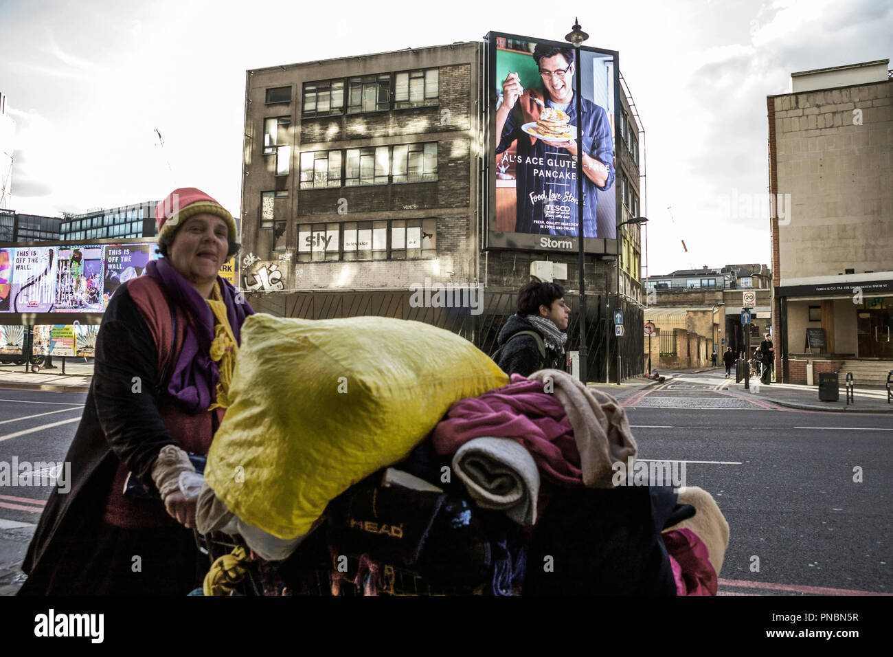 Homeless woman cart hi-res stock photography and images - Alamy