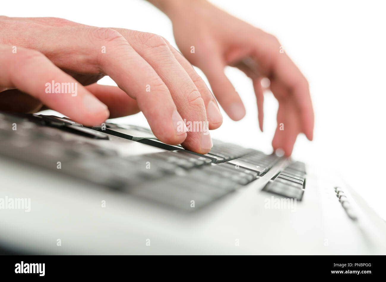 Detail of businessman hands typing on computer keyboard. Over white ...