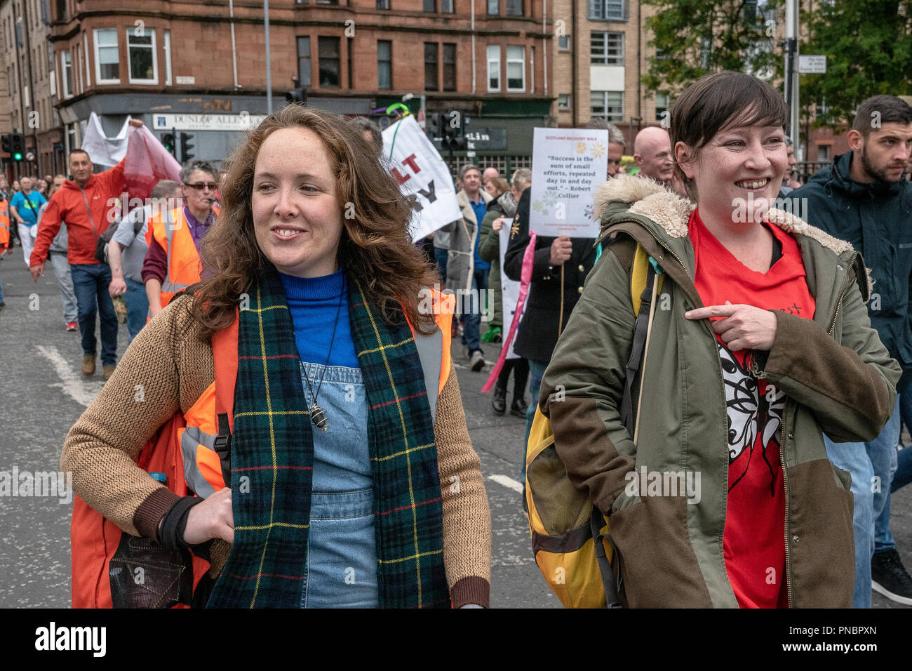 Two members of the Scotland recovery walk seen laughing during the walk ...