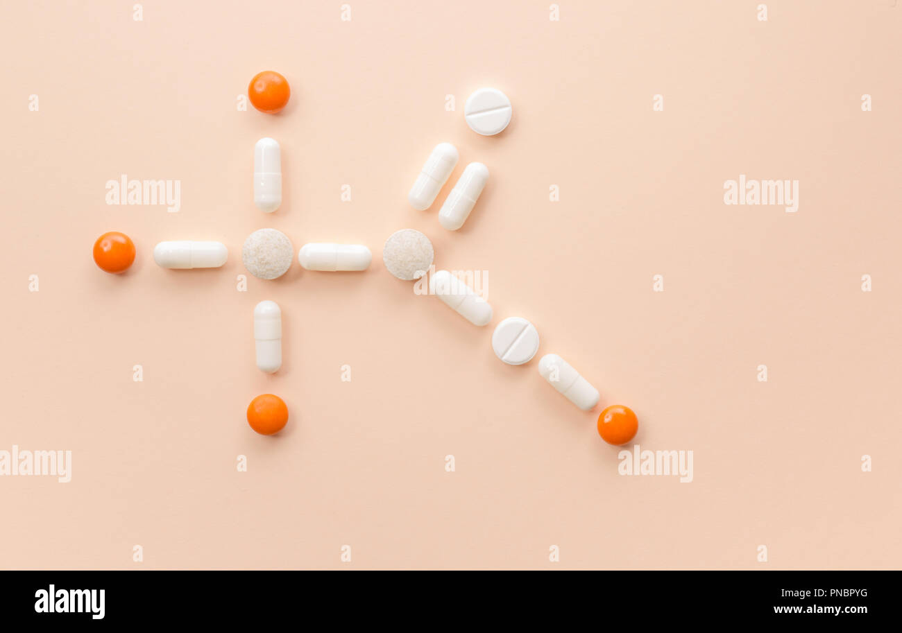 Chemical formula of tablets and pills on a solid background. Medical ...