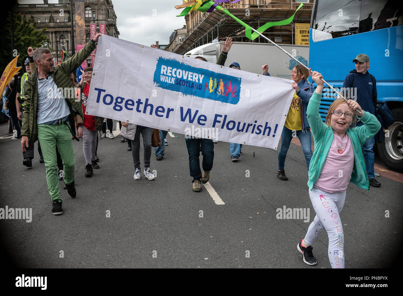 Members of the Scotland recovery walk seen holding up a banner Stock ...