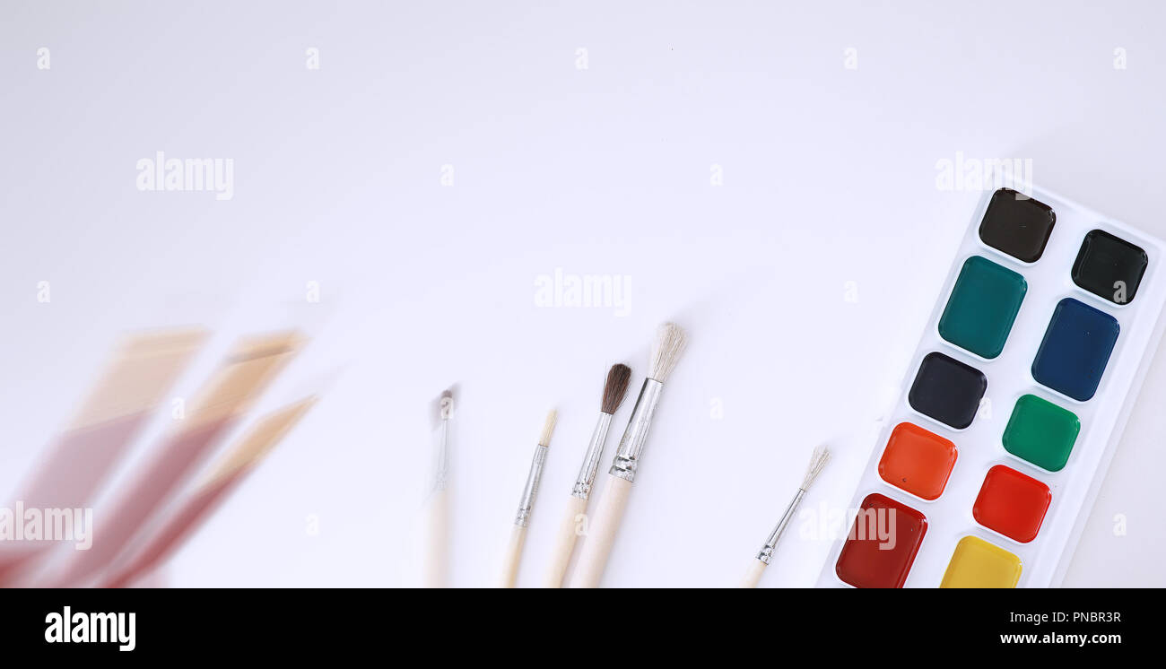 Drawing paints on a white sheet of paper Stock Photo - Alamy