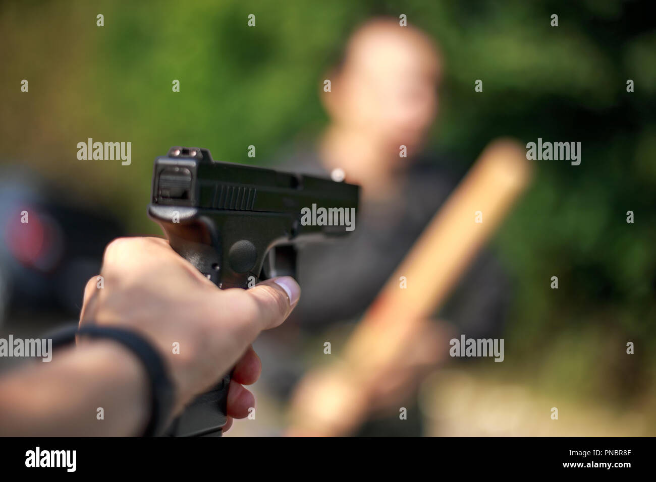 Gangster pointing gun hi-res stock photography and images - Alamy
